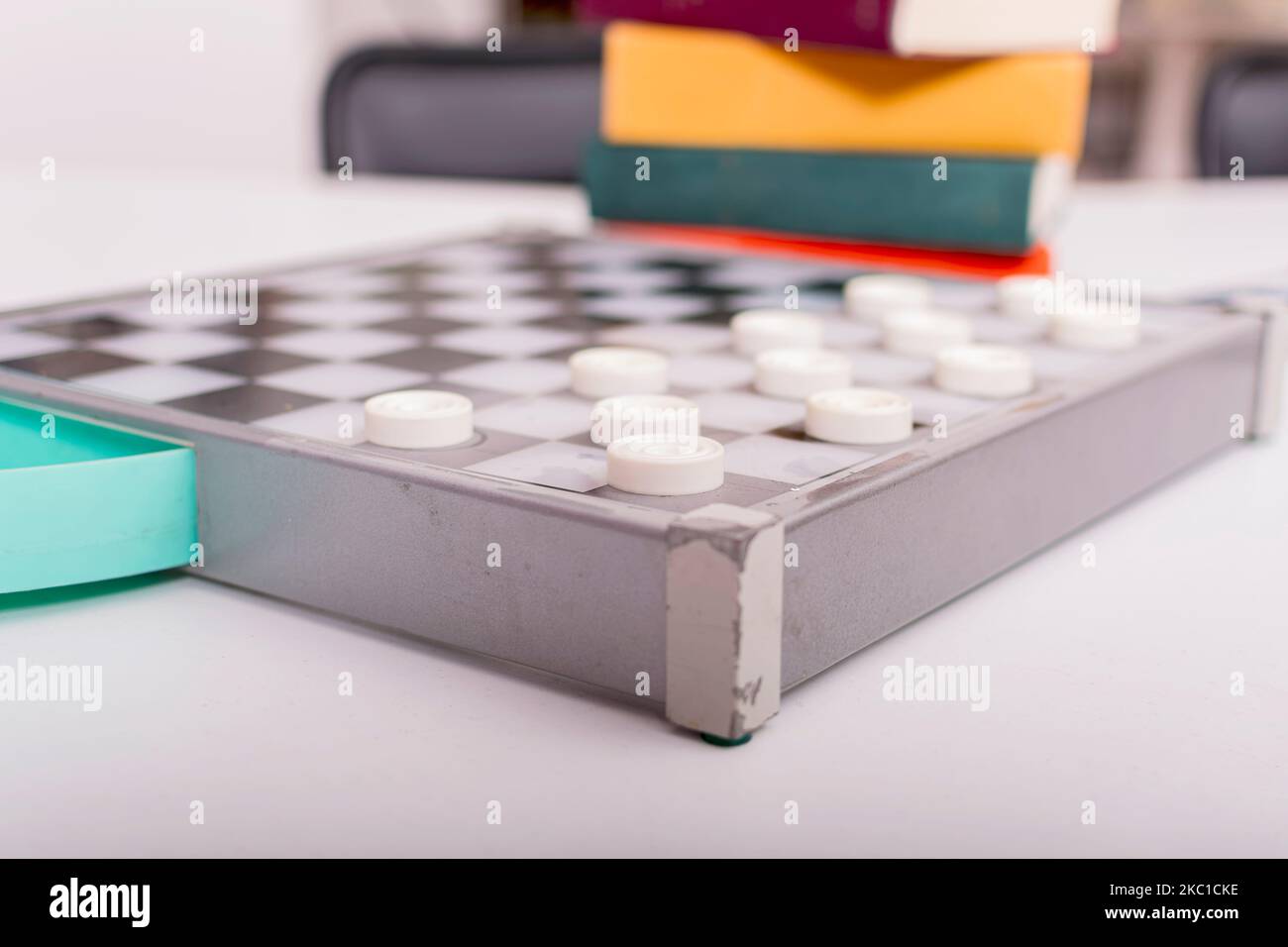 Checkers game. Pieces are placed on game board and everything is ready ...