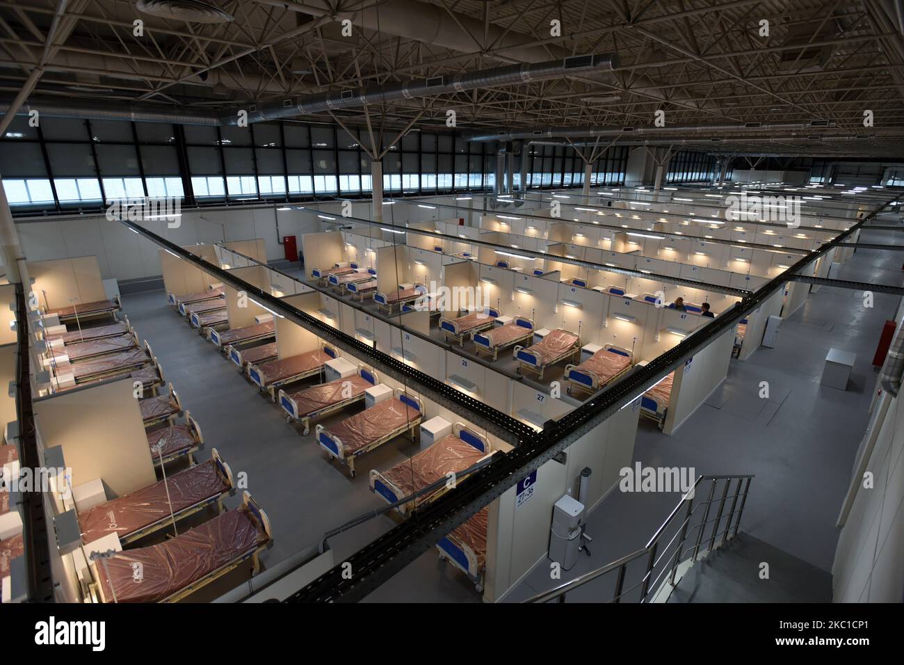 Hospital beds at a temporary medical facility for COVID-19 patients ...