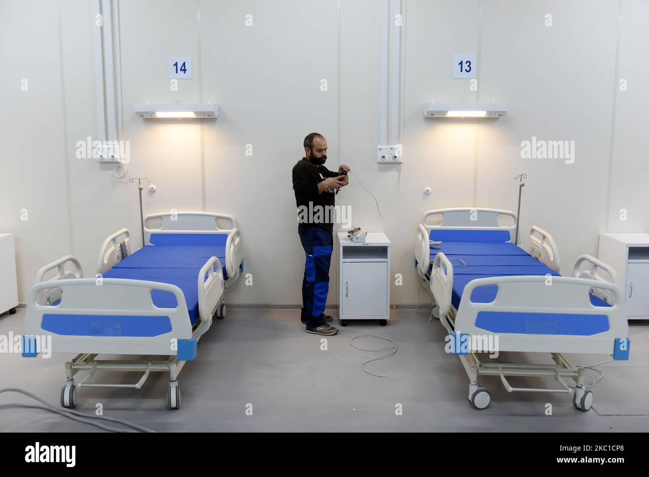 Hospital beds at a temporary medical facility for COVID-19 patients ...