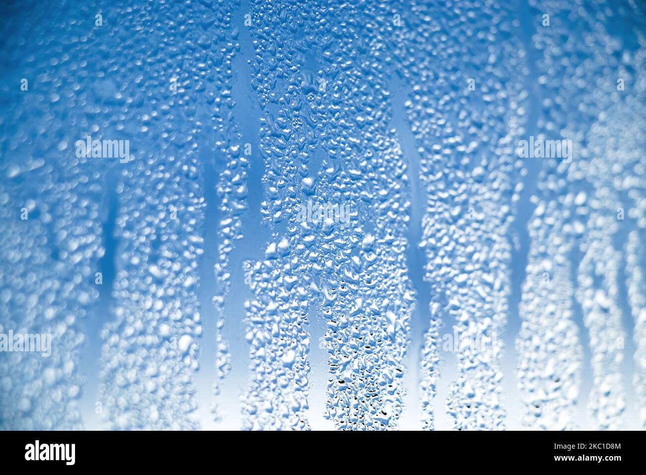 Texture of misted glass in winter. Frozen drops of water in sun on ...