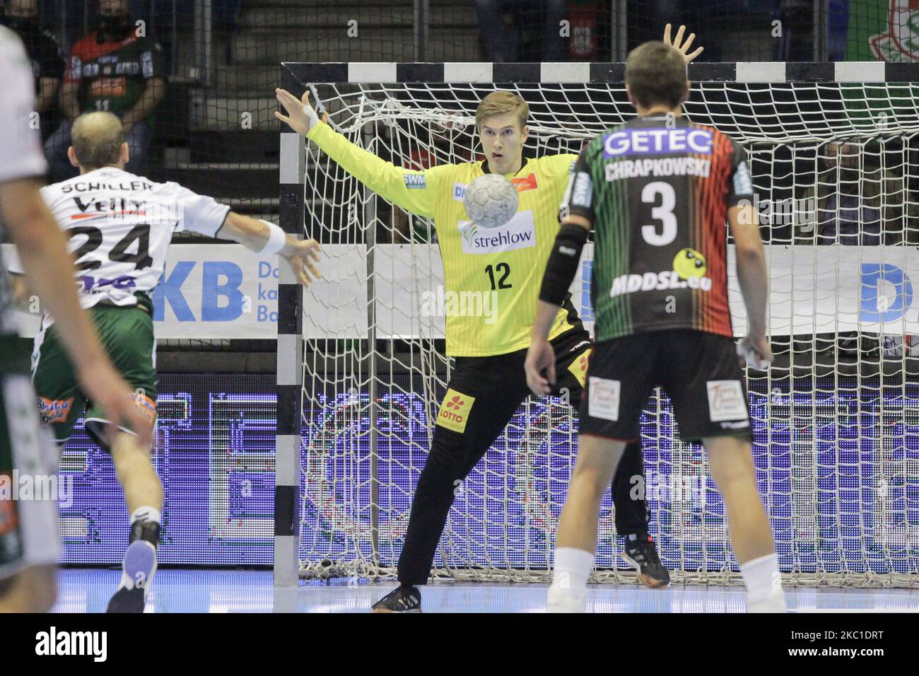 Marcel Schiller of Frisch Auf! Goeppingen against goalkeeper Tobias ...