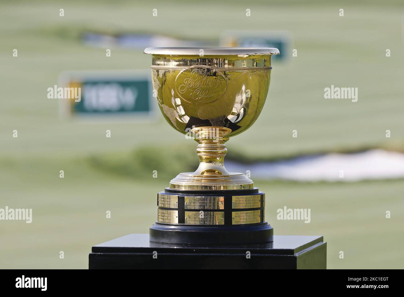 Cup trophy displayed on the green before group photo time during the ...