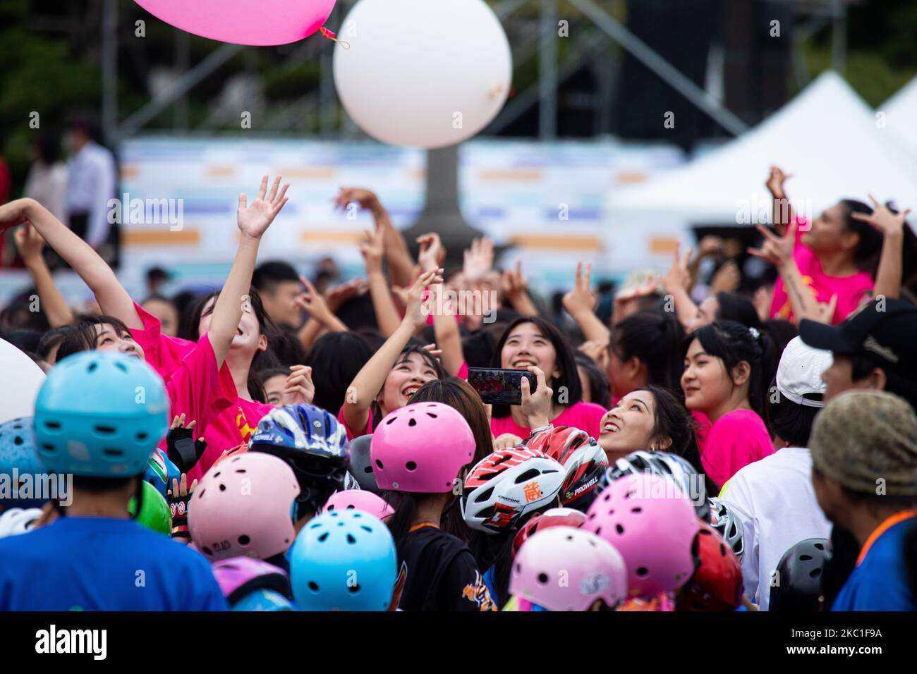 People celebrate at the end of the parade in Taipei, Taiwan on October ...