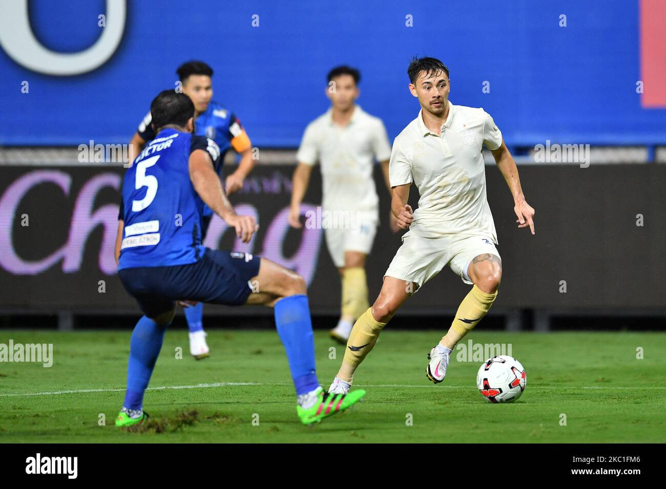 Kevin Langbehn Ingreso, (white) team player of Buriram United in action ...