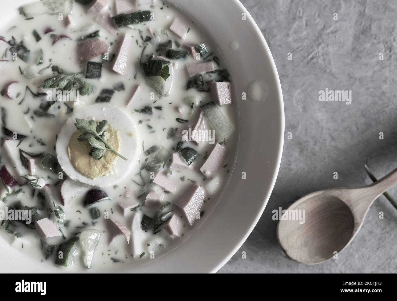 Traditional Russian cold summer soup - okroshka with fresh vegetables ...