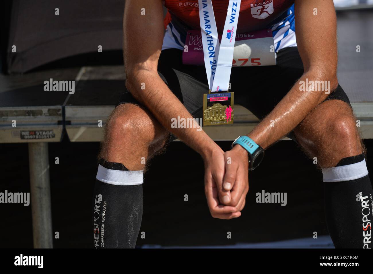 A runner seen recovering after finishing the 37th edition of Sofia ...