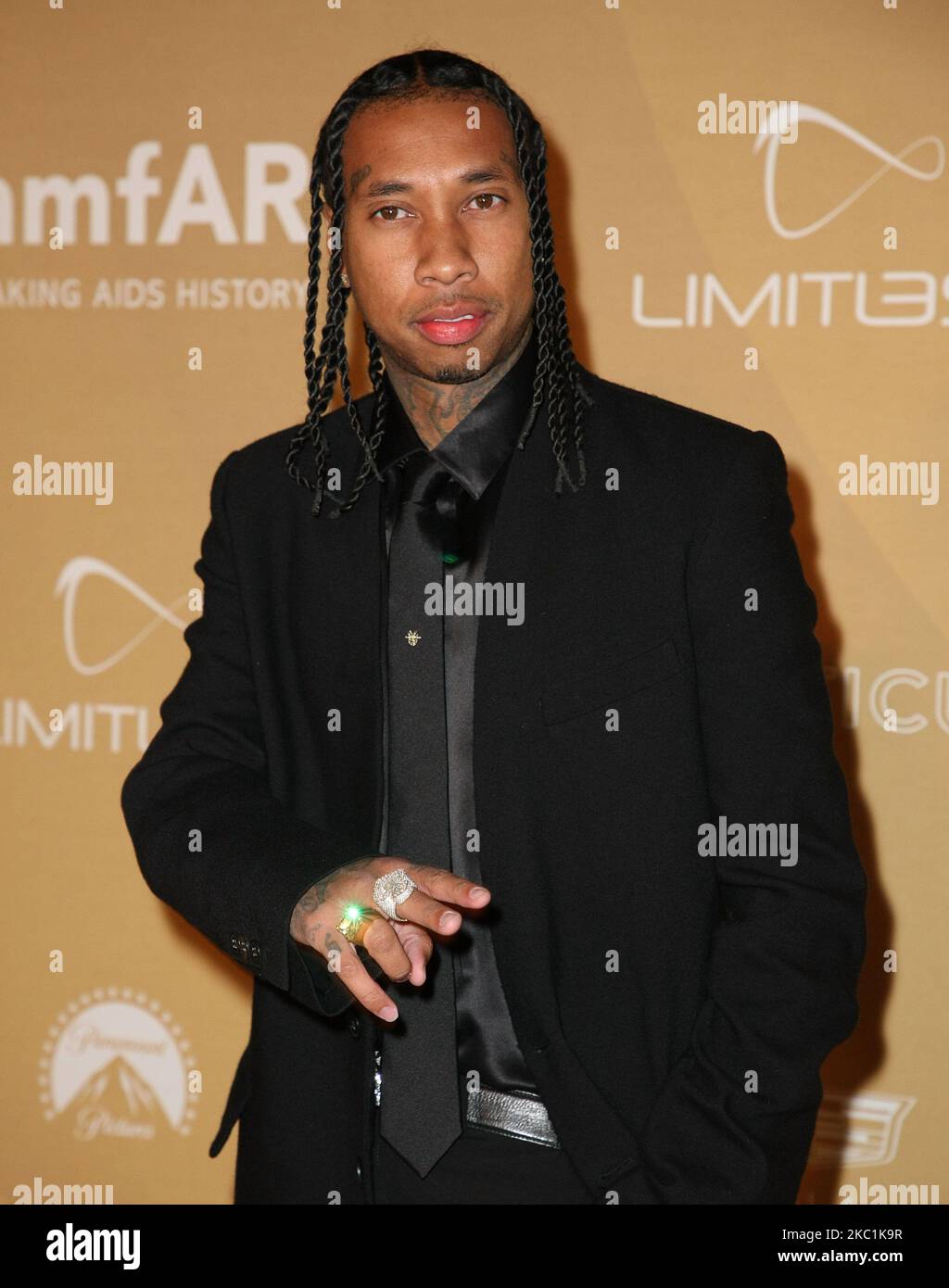 Tyga attends the 2022 amfAR Gala Los Angeles at Pacific Design Center ...