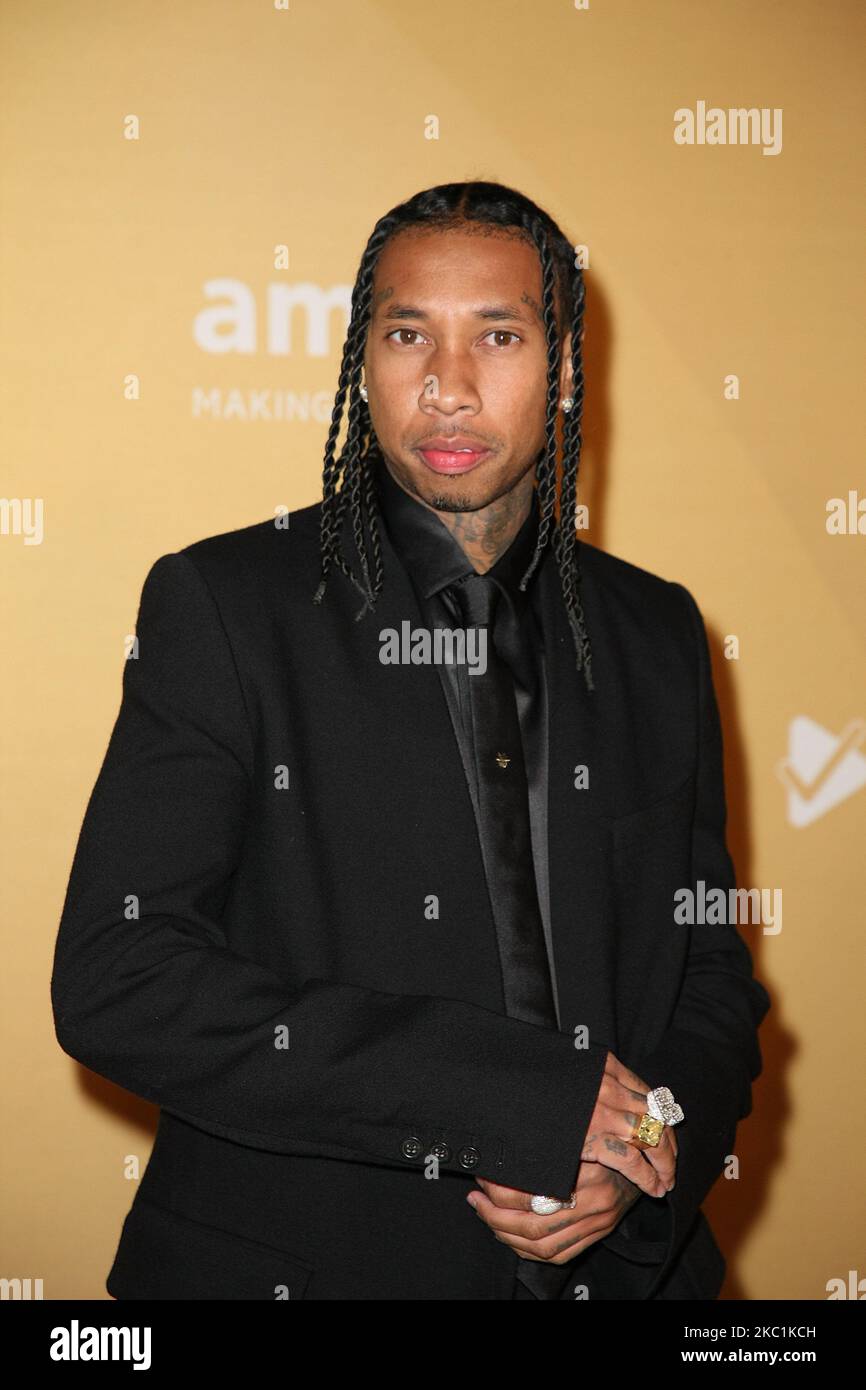 Tyga attends the 2022 amfAR Gala Los Angeles at Pacific Design Center ...