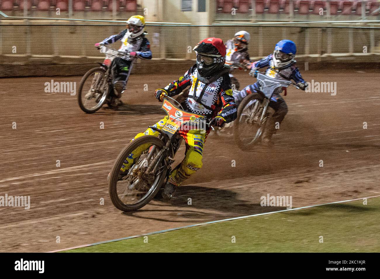 Dan Thompson (Red) leads Sam McGurk (Blue) Mickey Simpson (White) and ...