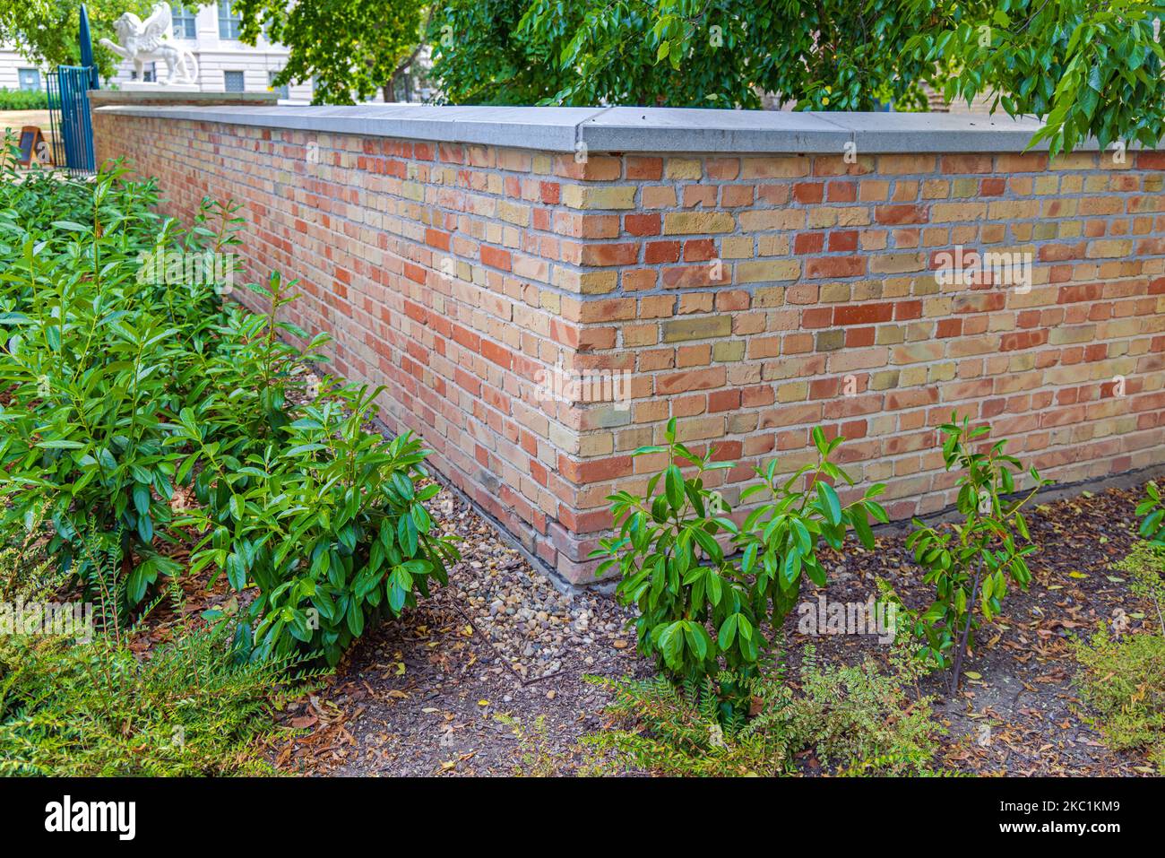 Brick Wall Corner Architectural Element in Garden Stock Photo - Alamy
