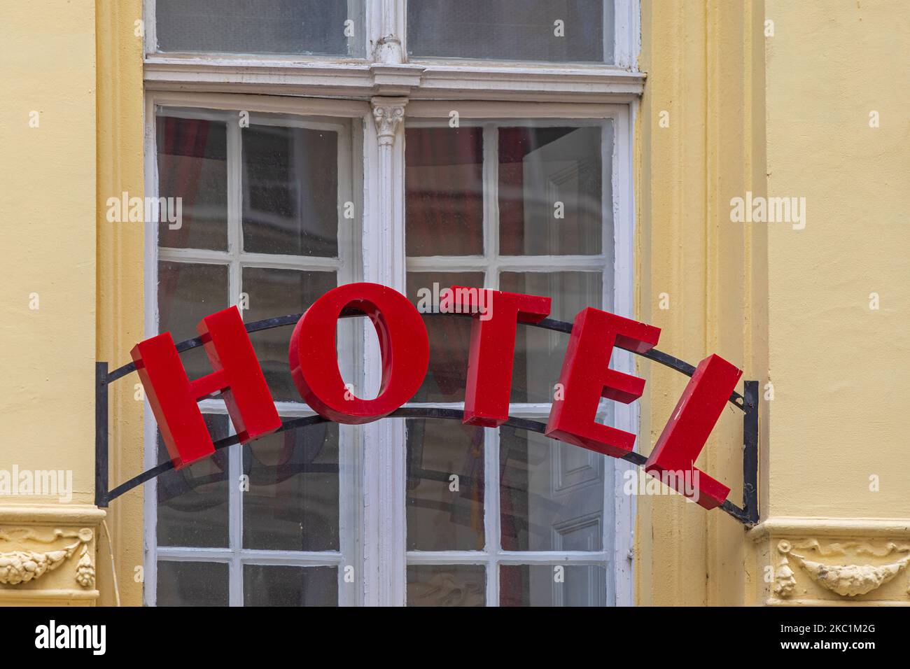 3d Red Hotel Sign in Front of Window Stock Photo - Alamy