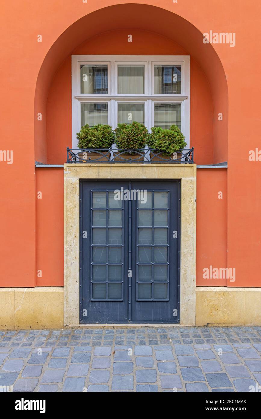 Closed Double Doors Arch Window With Potted Plants at Terracotta ...