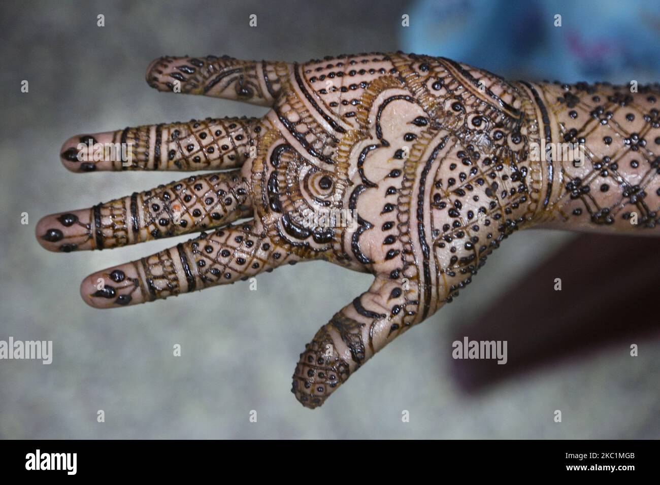 Bridal henna is applied to the hands and feet of a Hindu bride the ...