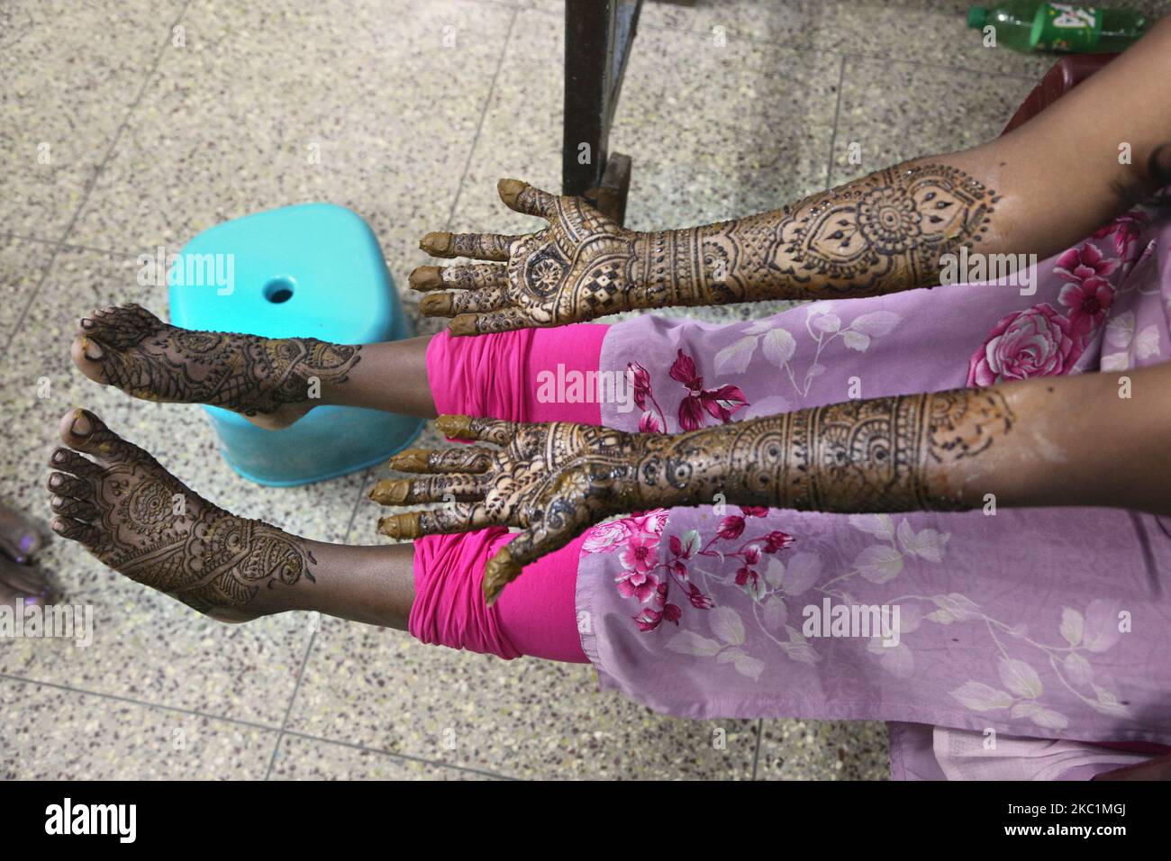 Bridal henna is applied to the hands and feet of a Hindu bride the ...