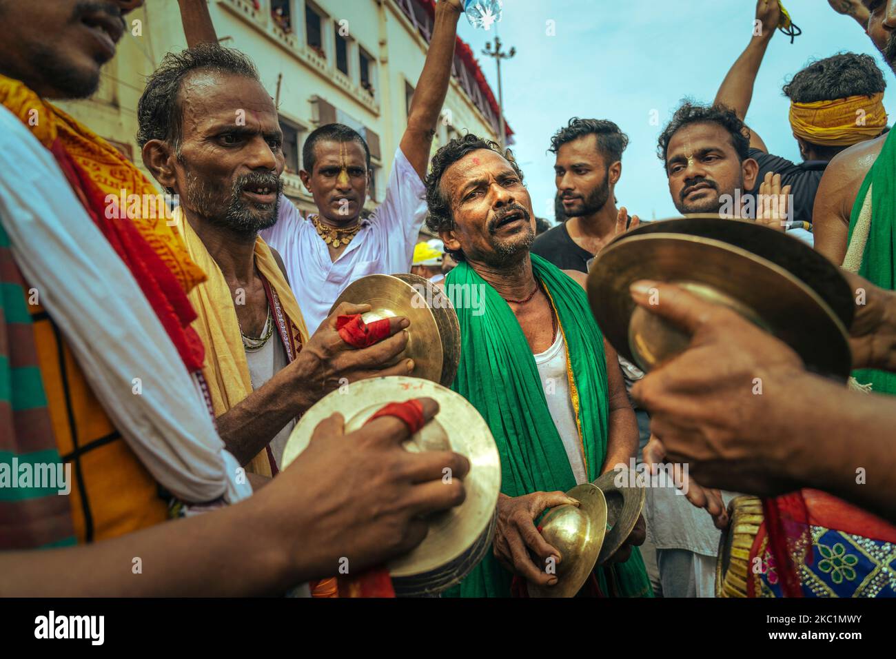 The group of Lord Krishna Devotees playing musical instruments on ...