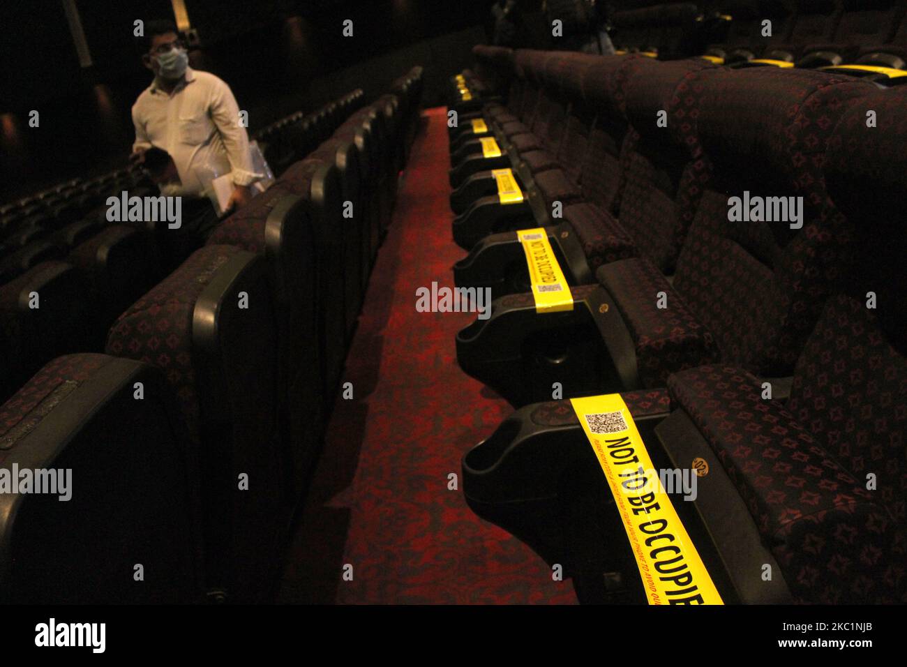 Social distancing markers are seen inside a theatre hall ahead of the ...