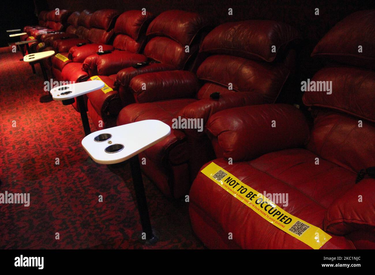 Social distancing markers are seen inside a theatre hall ahead of the ...