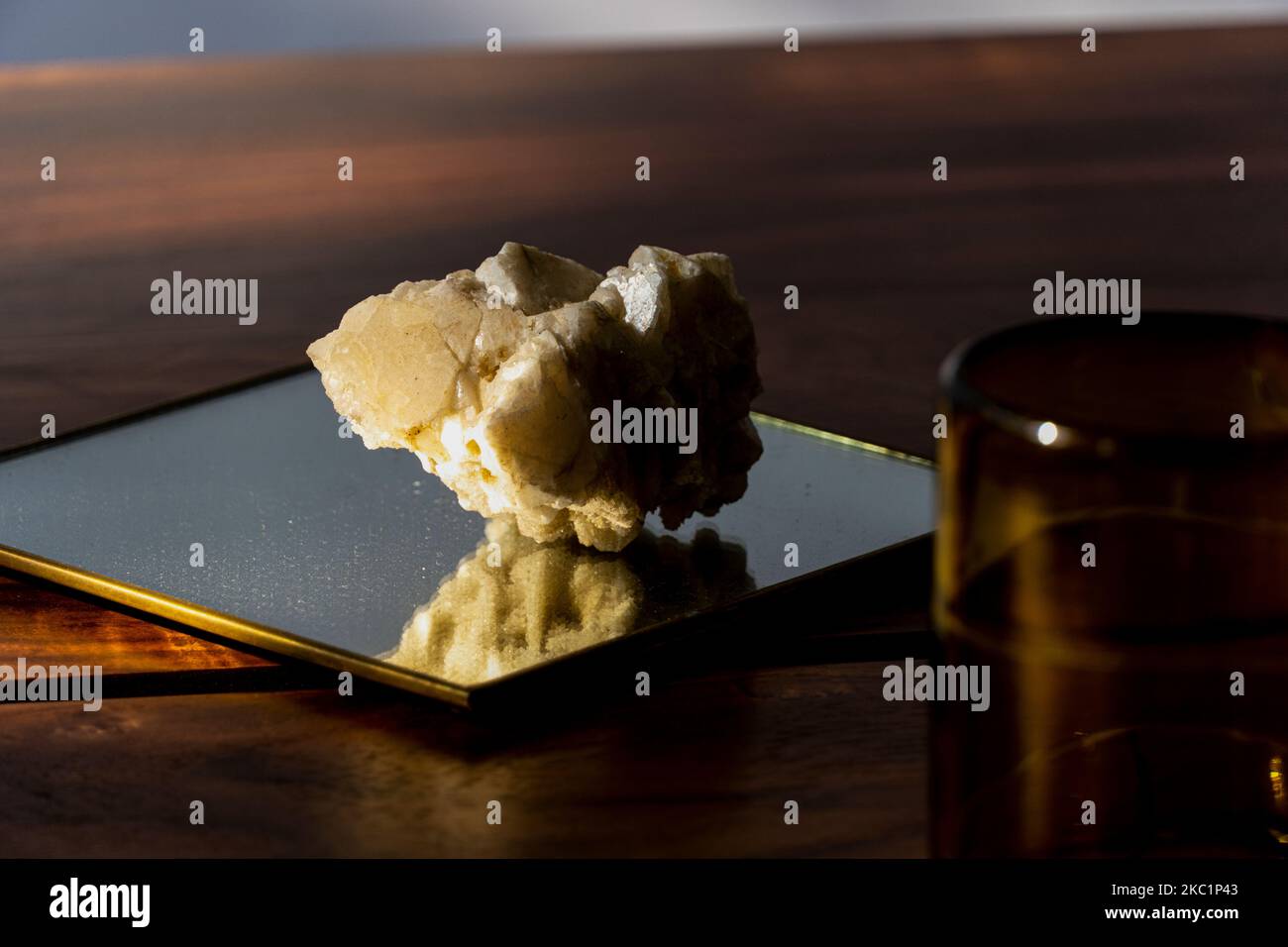 designer wood dining table, minimalist and simple objects on the table ...