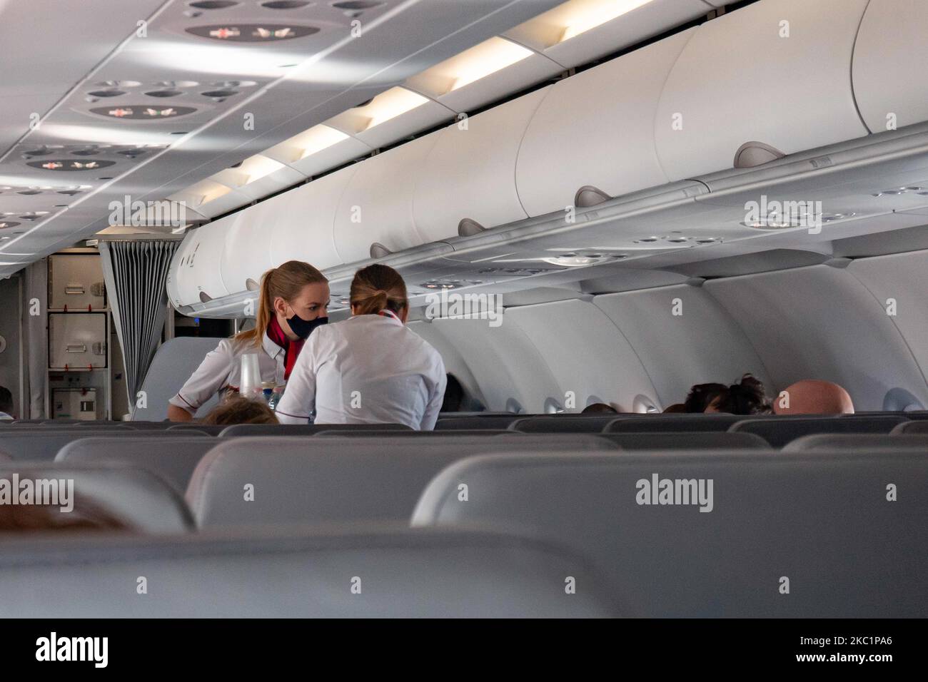 Cabin Crew, Flight attendant are serving during the flight while they ...
