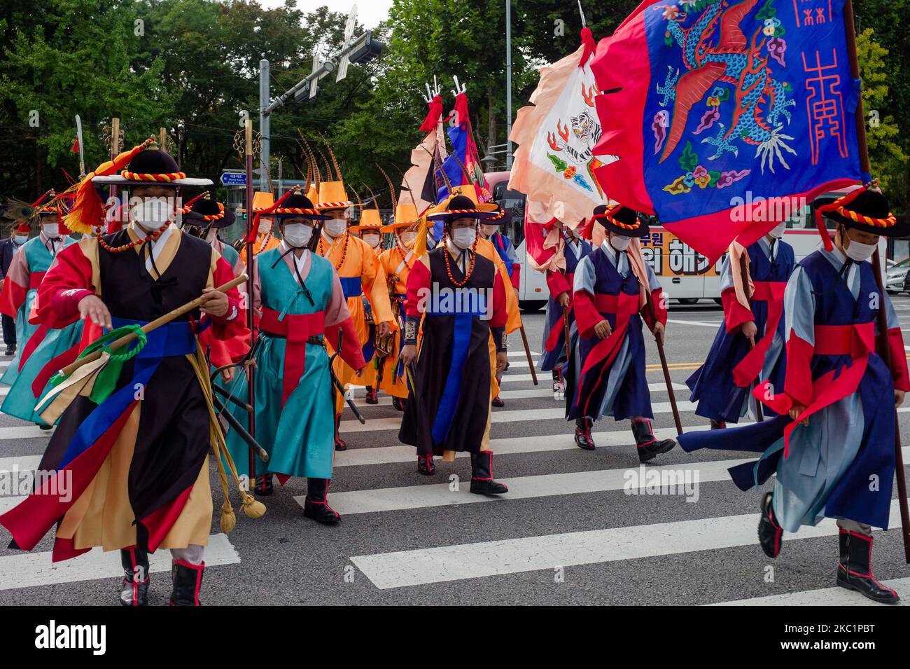 South Korean Imperial guards wearing masks as South Koreans take ...