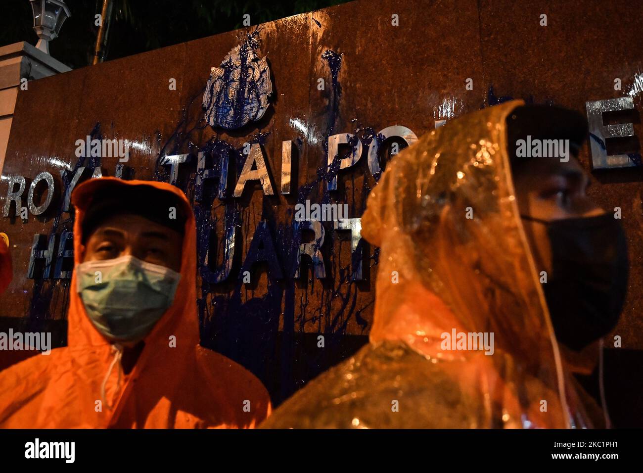 Royal Thai Police banner was splashed blue paint by protesters to ...