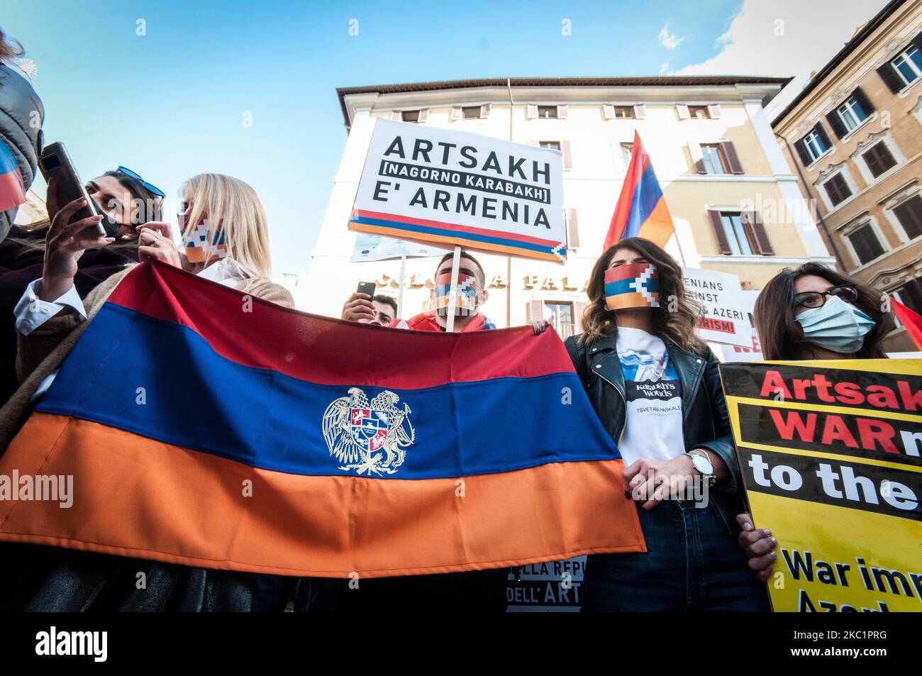 Demonstrator of the Armenian people hold banners and flag in ...