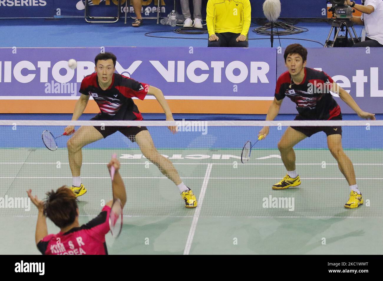 South Korea's Lee Yong Dae and his team mate Yoo Yeon Seong play match ...