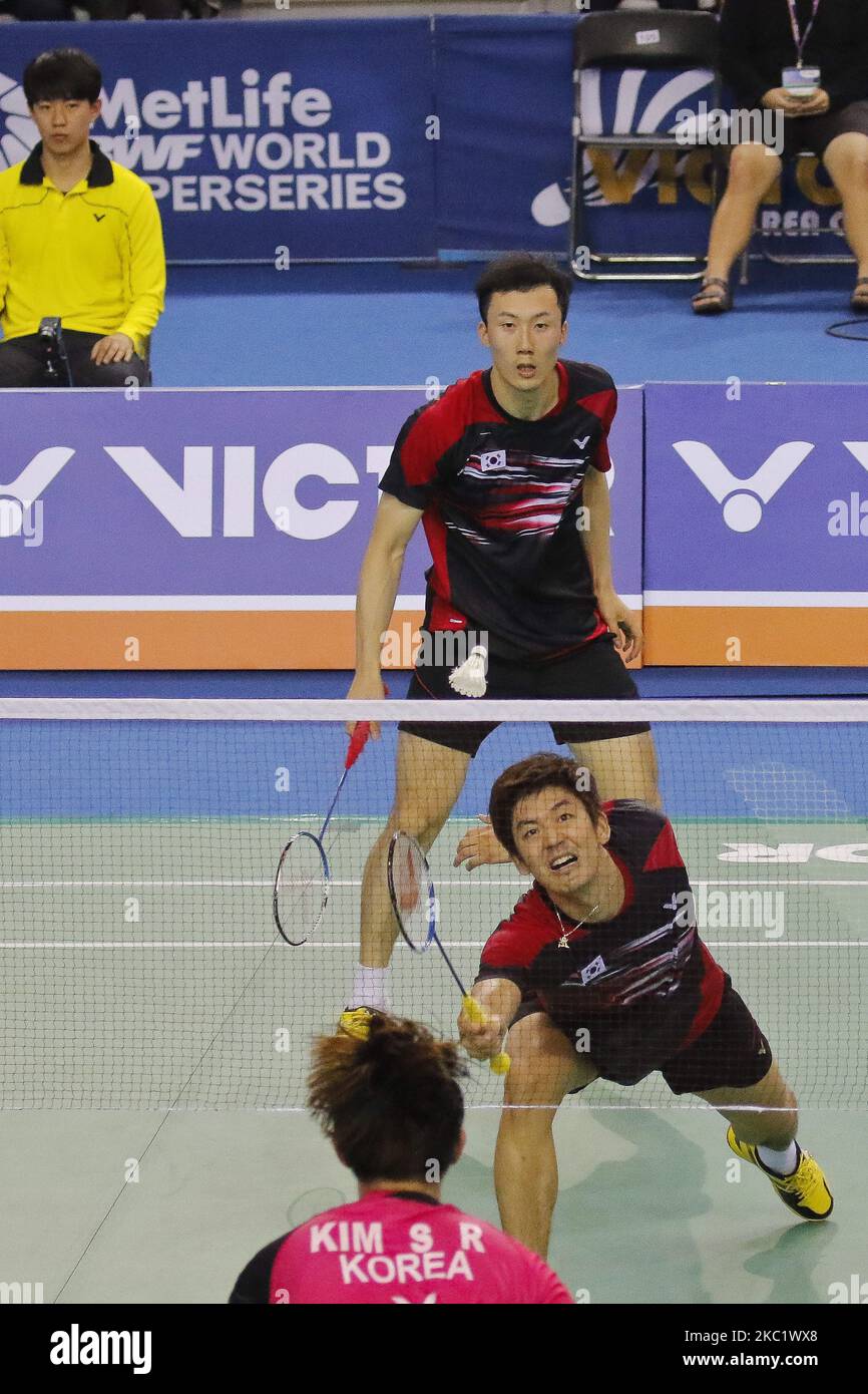 South Korea's Lee Yong Dae and his team mate Yoo Yeon Seong play match ...