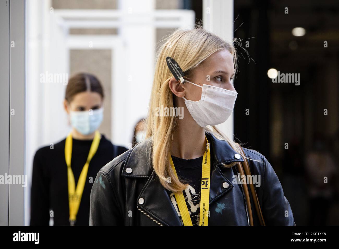 Model trains positions on the runway of the show, with the proper mask ...
