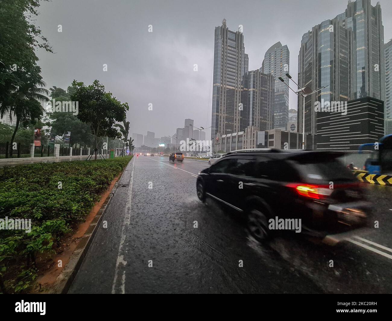 View of streets in Jakarta, Indonesia covered with water as heavy rain ...