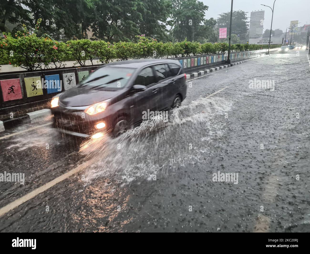 View of streets in Jakarta, Indonesia covered with water as heavy rain ...