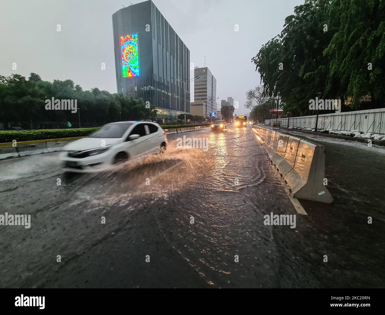 View of streets in Jakarta, Indonesia covered with water as heavy rain ...