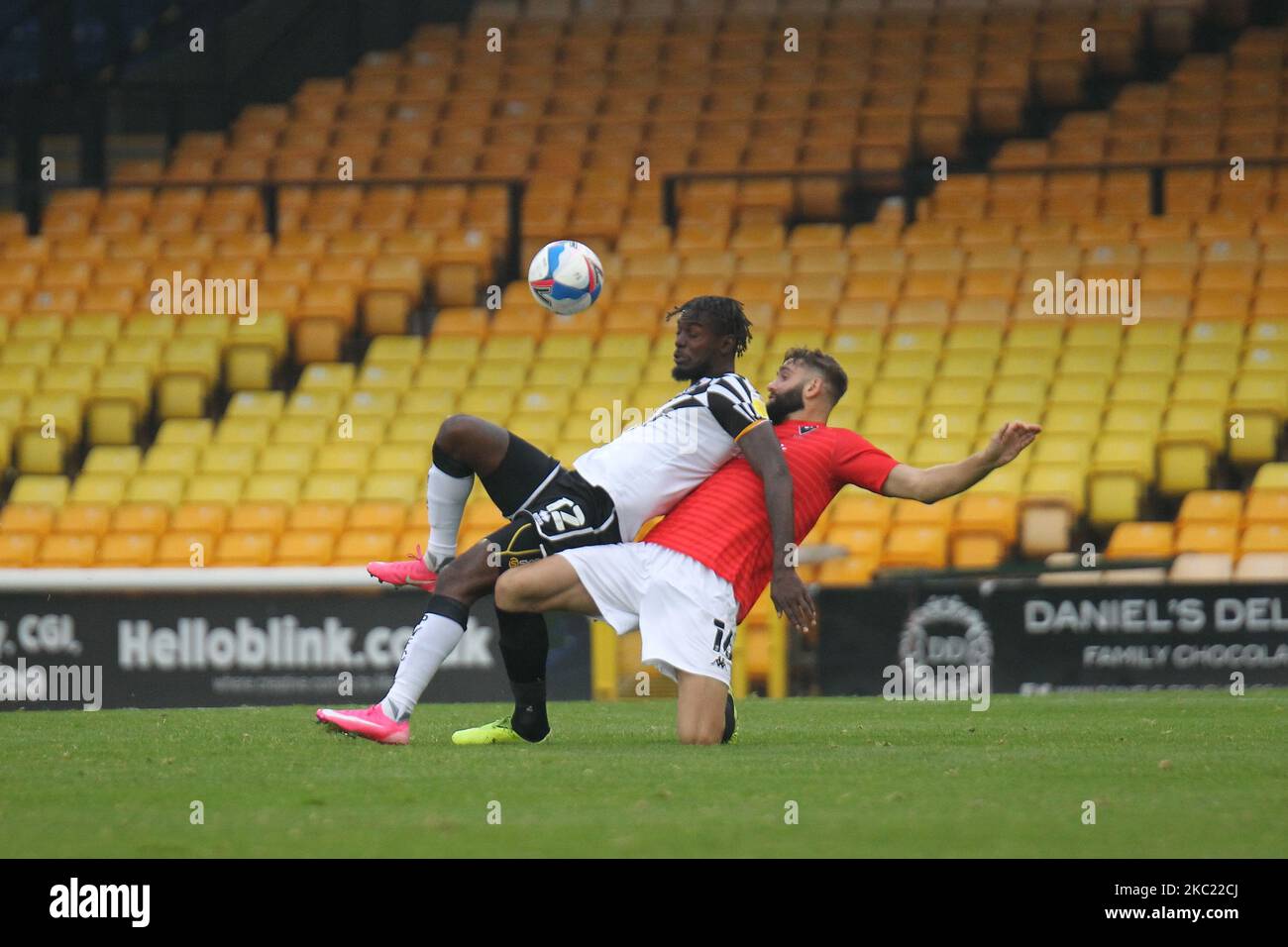 Theo Robinson of Port Vale in a challenge with Jordan Turnbull of ...