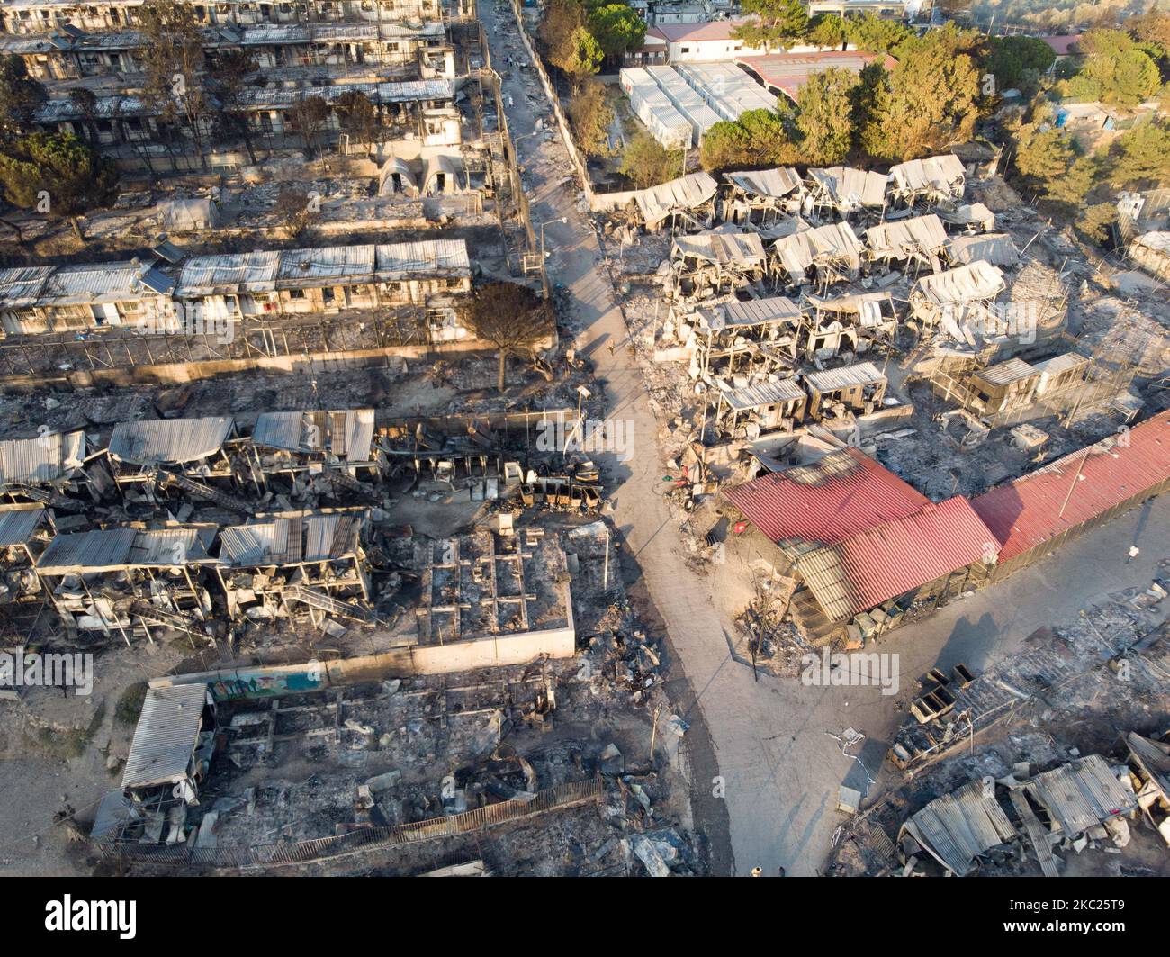Panoramic view from a drone of the aftermath of the first fire in Moria ...