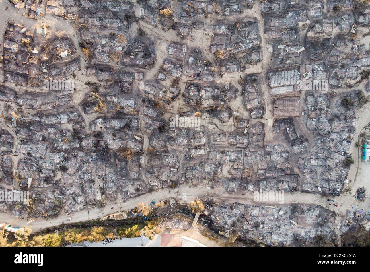 Panoramic view from a drone of the aftermath of the first fire in Moria ...