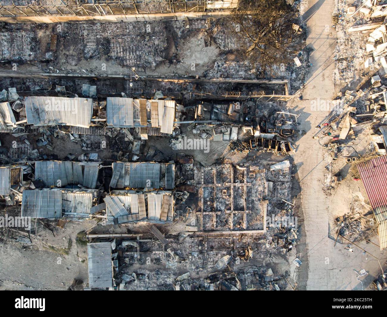 Panoramic view from a drone of the aftermath of the first fire in Moria ...