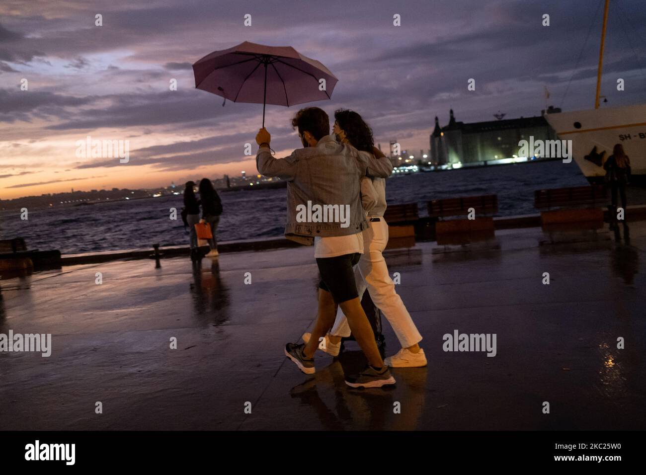 People run from heavy rainfall in Istanbul, Turkey on October 19, 2020 ...