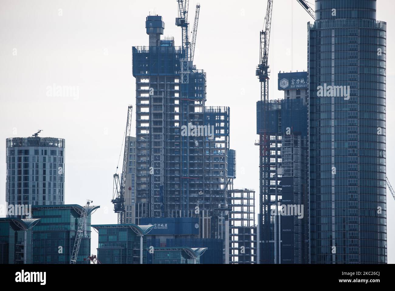 Construction work continues on high-rise buildings beside the River ...