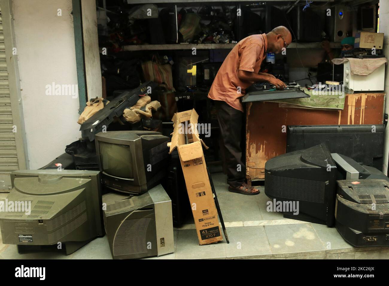 Old man television repairman hi-res stock photography and images - Alamy