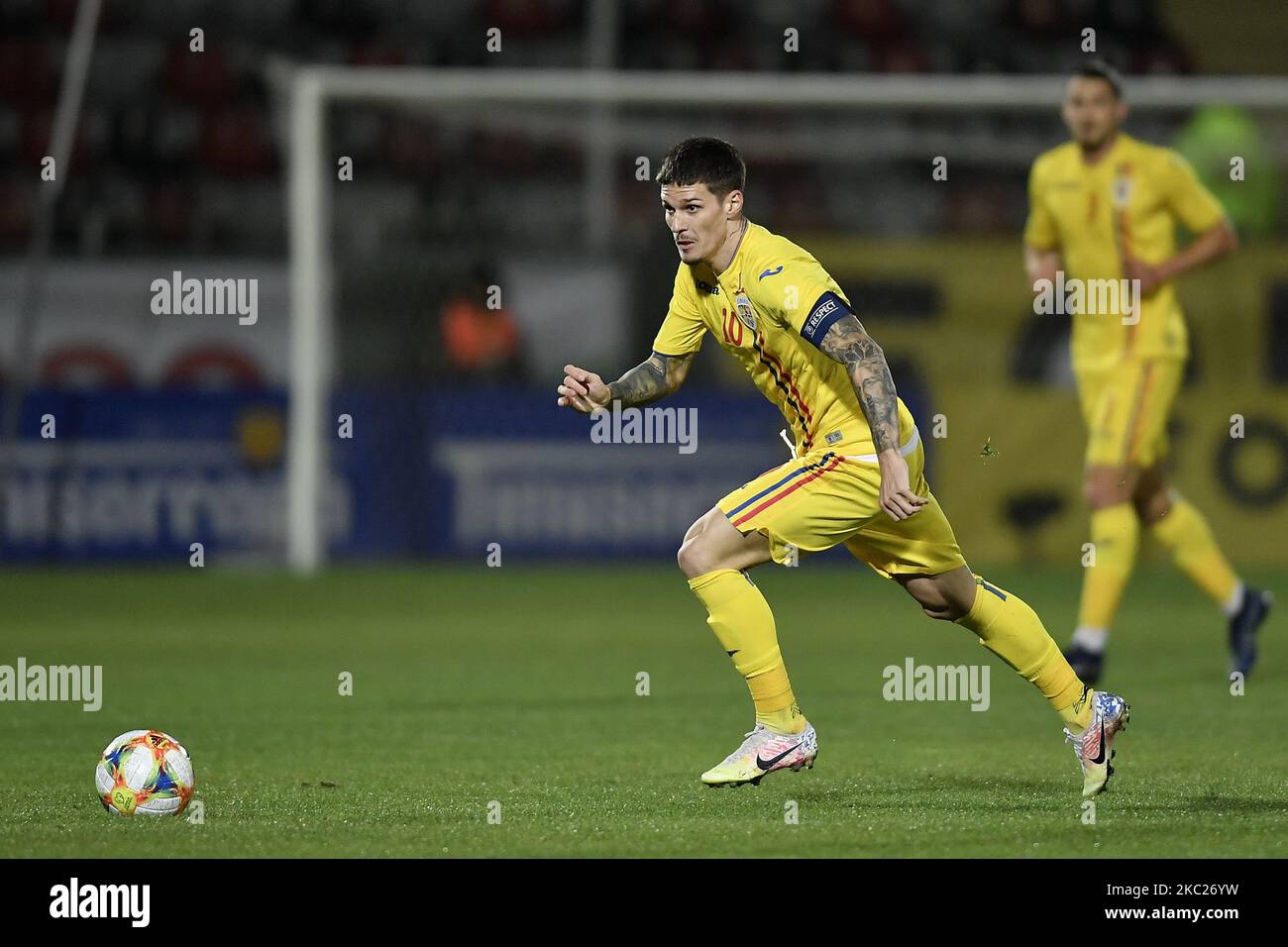 Dennis Man of Romania in action during the soccer match between Romania ...