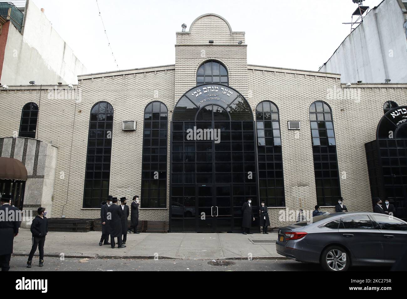 Worshipers of the Congregation Yetev Lev D'Satmar synagogue gather ...