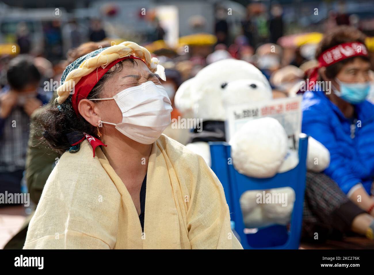 Merchants from the Federation of Street vendors shout slogans during a ...