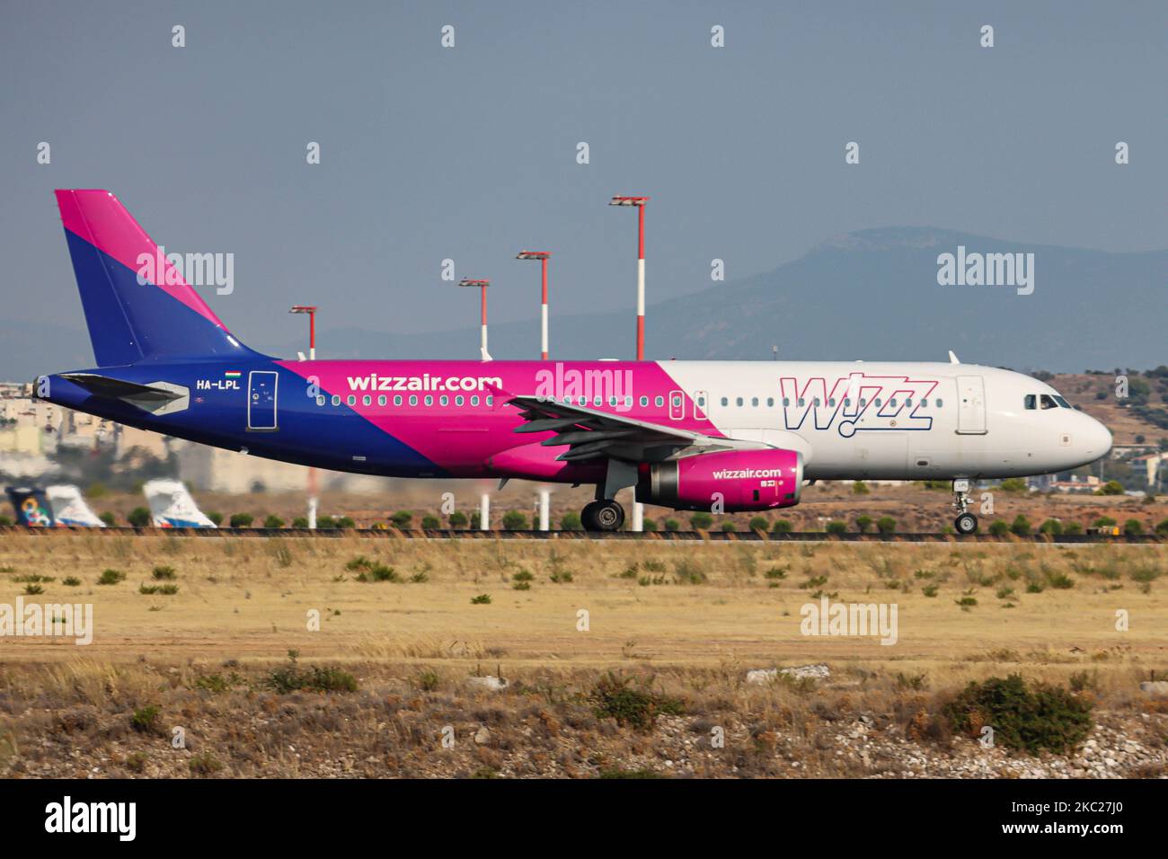 A Wizz Air budget airline Airbus A320-200 aircraft as seen during taxiing, takeoff, rotation and ...