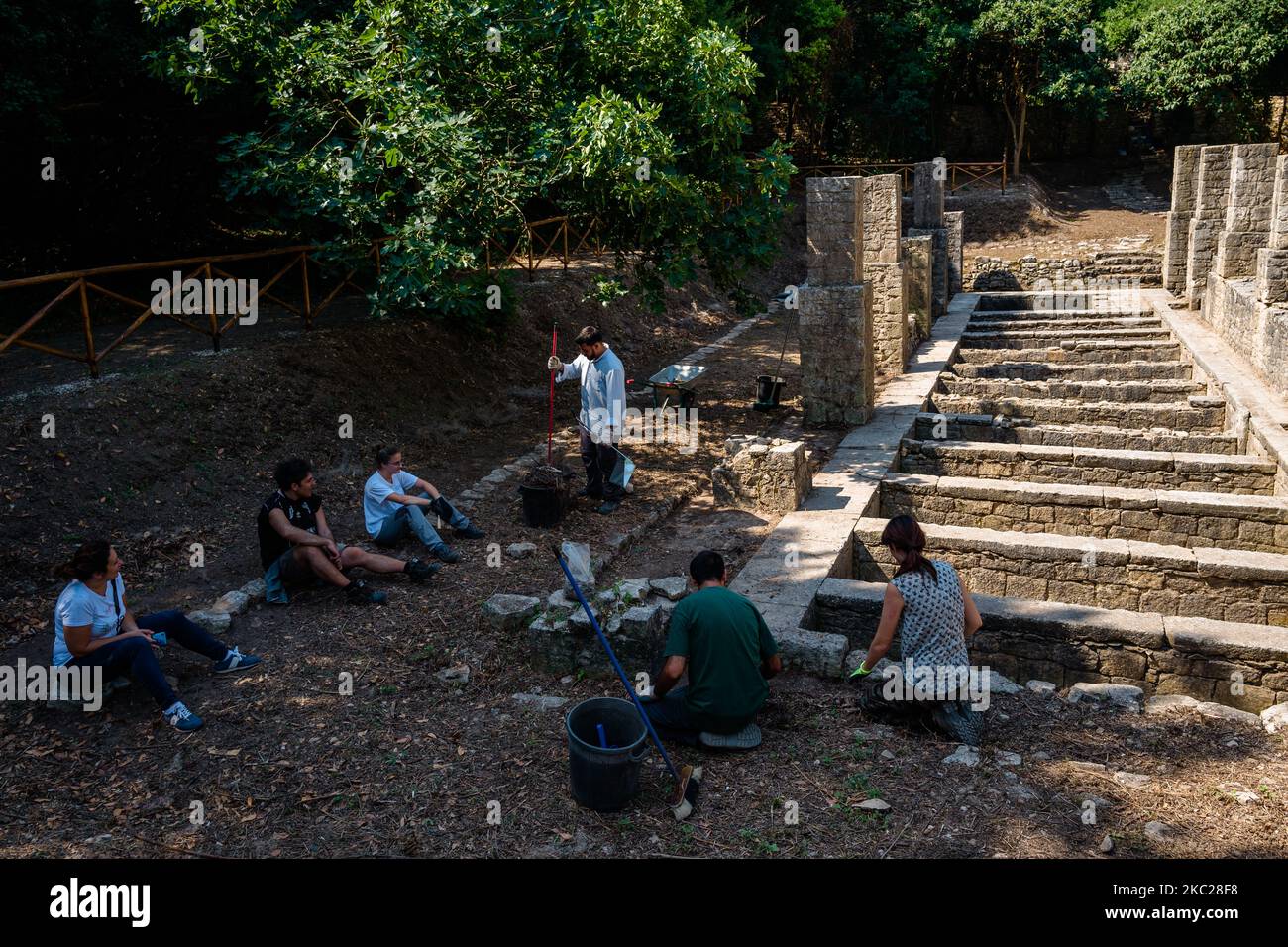 Archaeologists inside the Pulo di Molfetta, a karst sinkhole, near the ...