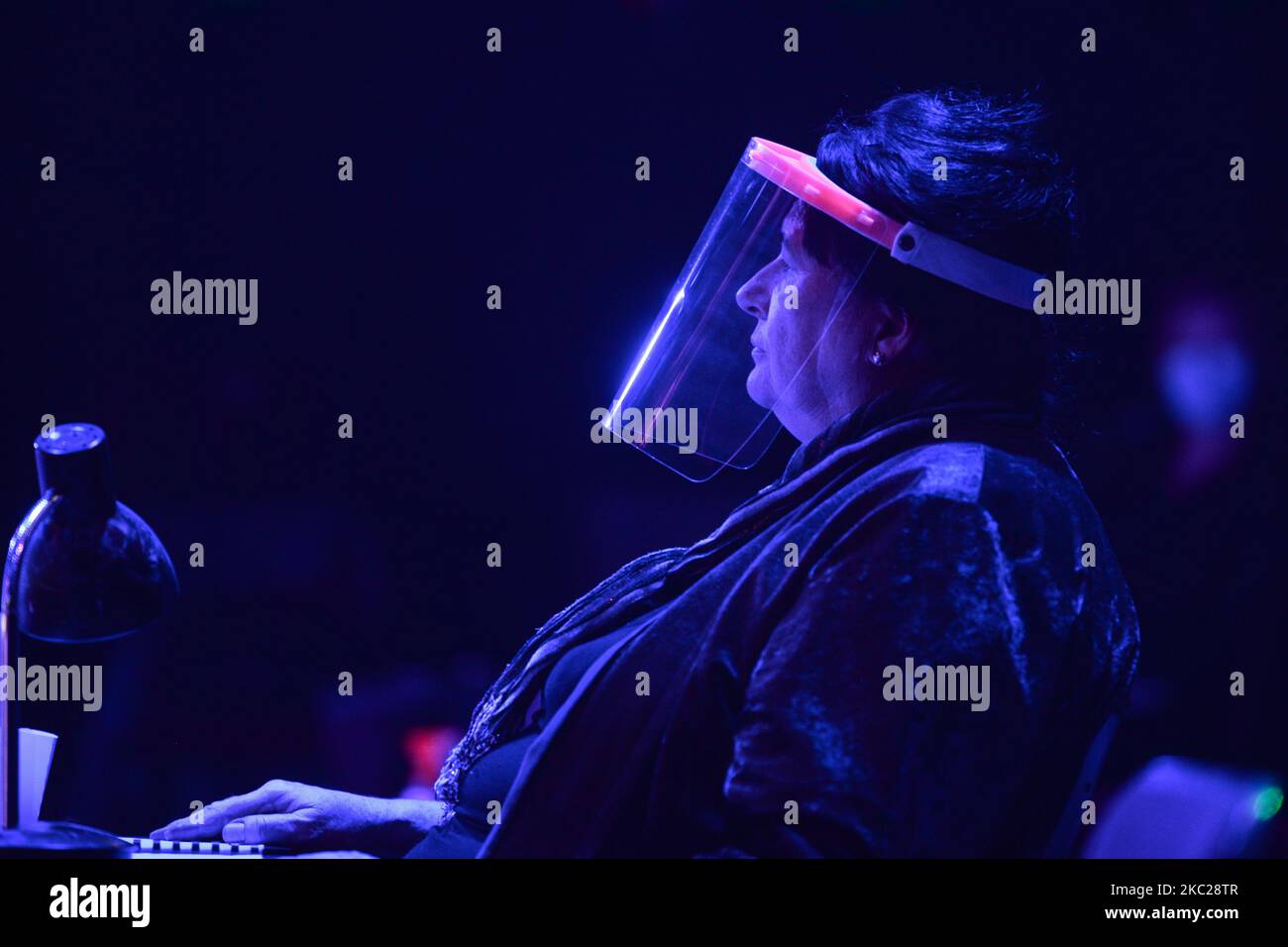 A lady wearing a face visor during a media rehearsal of 'Ameri Cane ...