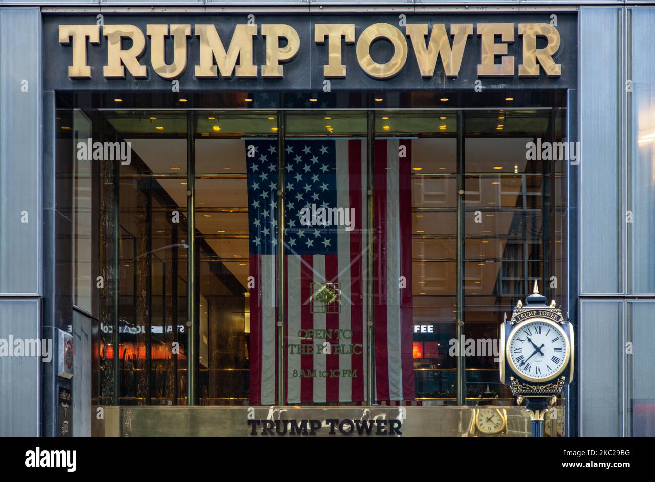The main entrance of Trump Tower with the inscription on it and a US ...