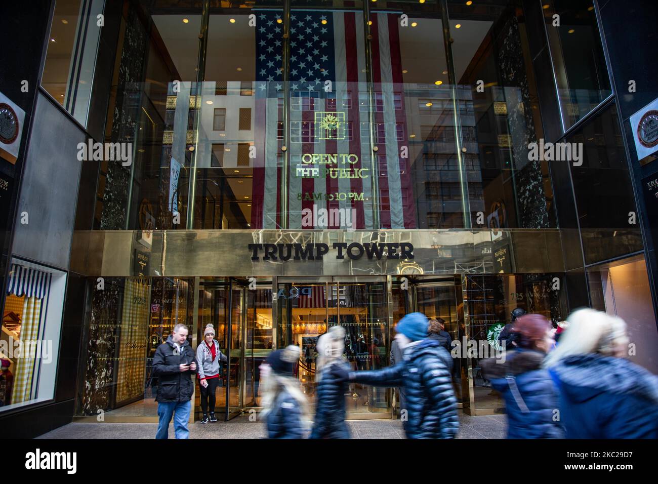 The main entrance of Trump Tower with the inscription on it an a US ...