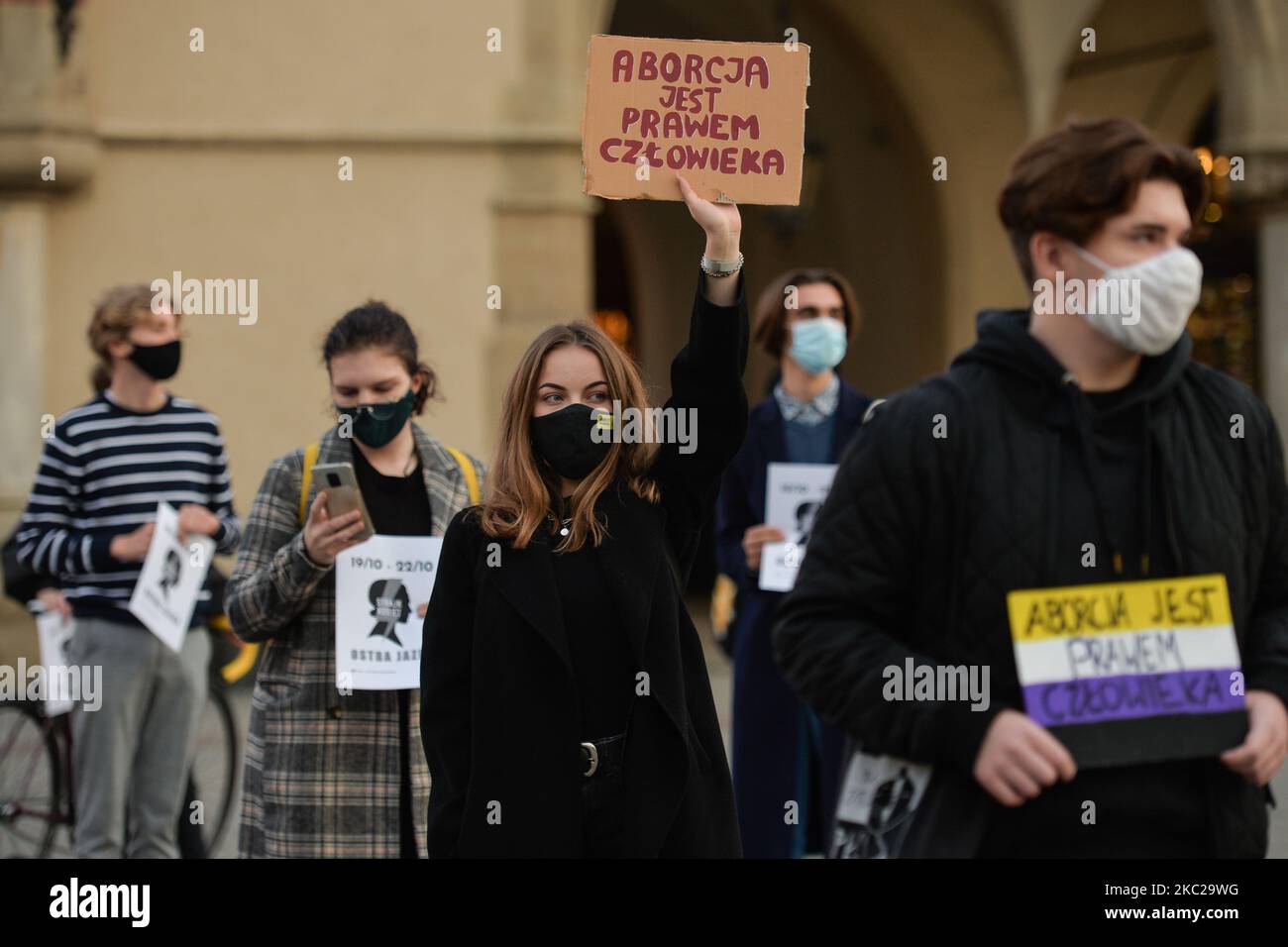 Pro-Choice activist holds a sign that says 'Abortion Is A Human Right ...