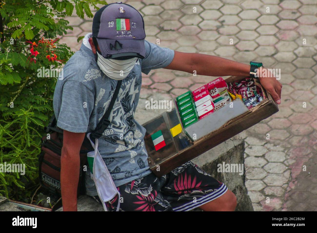 Smoker in public is seen in Antipolo City, October 22, 2020. Cigarettes ...