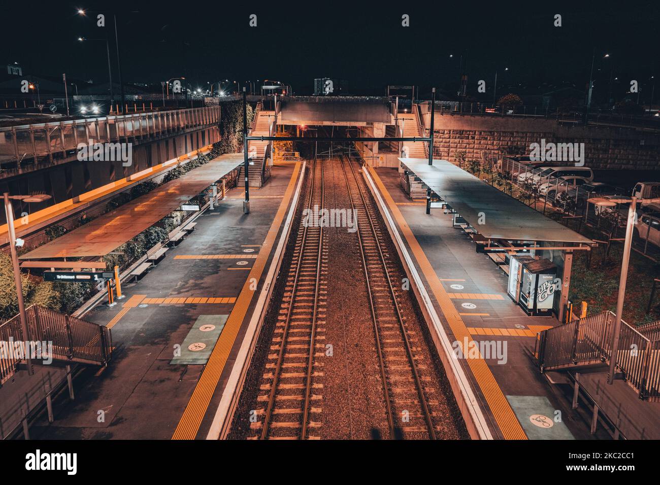 A high angle shot of the Panmure train station at night in Auckland ...